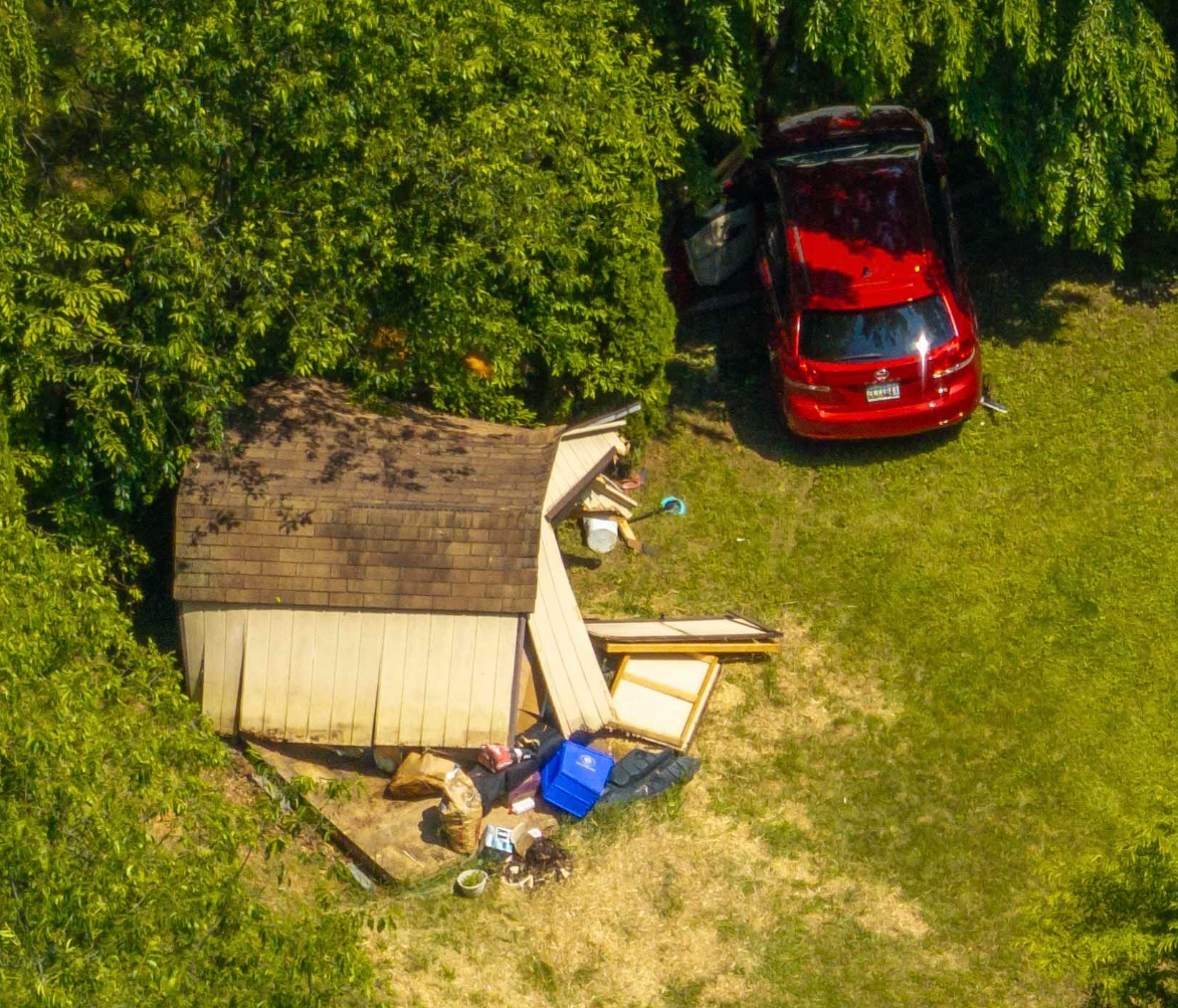 Driver Crashes Through Fence and Into Shed - The MoCo Show